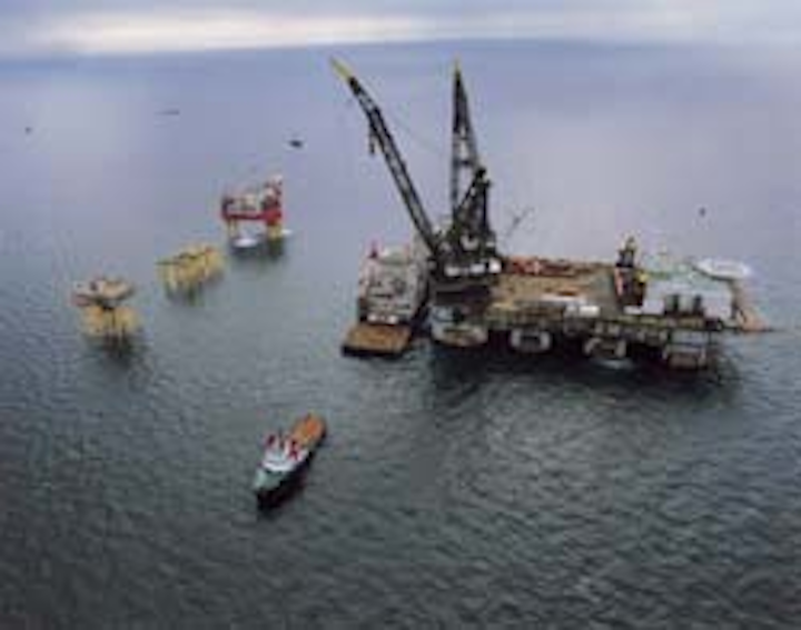 HEAVY LIFT OPERATIONS HeereMac vessel DB102 at work on BHP's Douglas ...